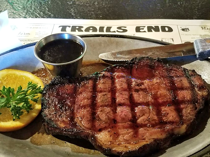 This isn't just a steak—it's a masterpiece of meat. The grill marks tell stories of perfect timing and temperature that would make Prometheus proud.