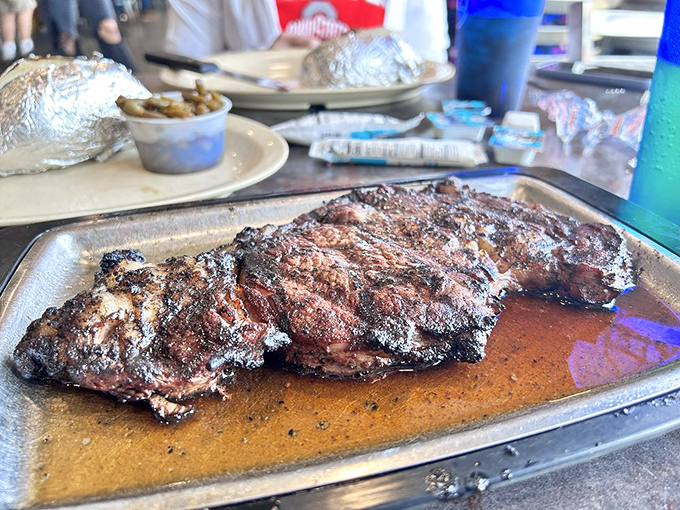 These perfectly charred steaks could make a vegetarian reconsider their life choices. The grill marks aren't just decoration—they're the restaurant's signature autograph.