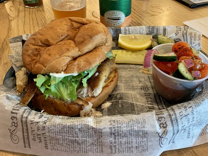 This isn't just a sandwich; it's Florida on a bun. Golden grouper, crisp lettuce, and a side of fresh veggies—simplicity that speaks volumes.