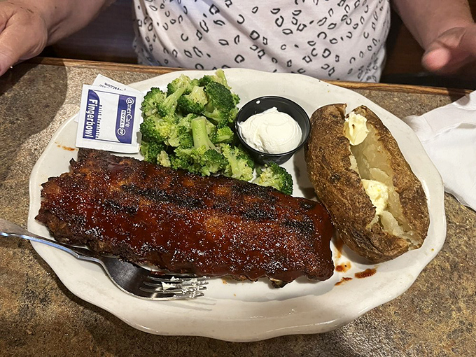 These fall-off-the-bone ribs don't need a mining permit to strike gold—served with a loaded baked potato and broccoli, it's comfort food that hits the motherlode.