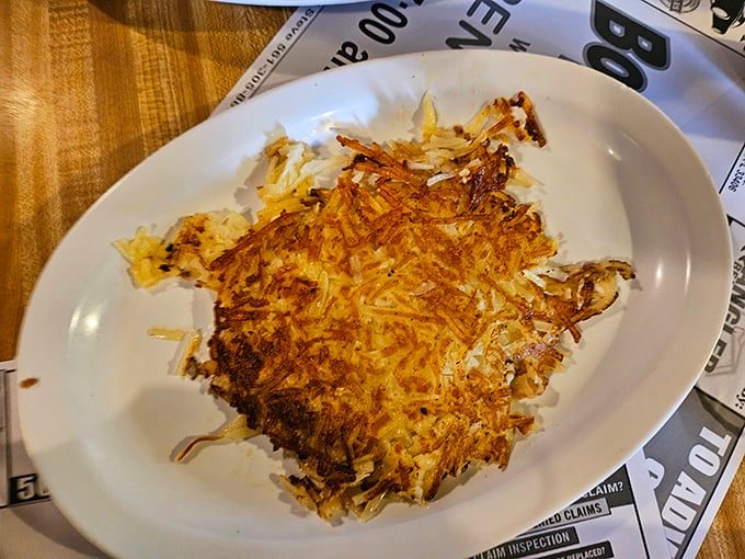 Golden-brown hash browns that crackle with each bite. The holy grail of breakfast potatoes – crispy exterior, tender inside, perfectly seasoned.