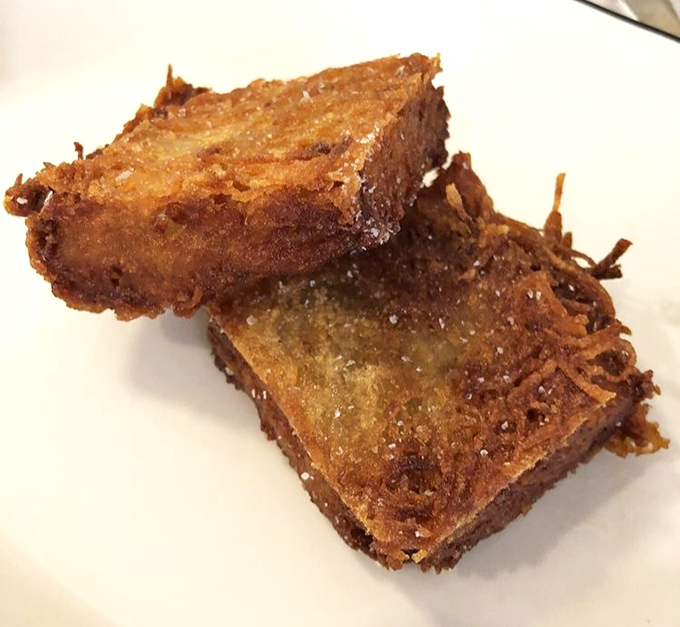 These aren't just hash browns; they're golden potato monuments to breakfast perfection. Crispy exterior, tender inside—the breakfast equivalent of winning the lottery.