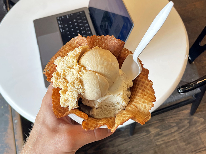 This isn't just ice cream in a waffle bowl—it's edible architecture supporting scoops of pure, creamy bliss.