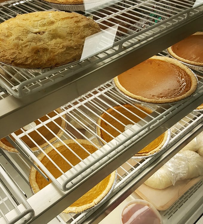 Fresh pies cooling on racks – the bakery equivalent of a siren song. Resistance is futile, especially when pumpkin season arrives.