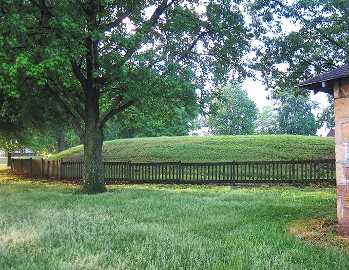 This grassy historic mound stands as a silent witness to centuries of Ohio River Valley history, its purpose a whispered conversation across time.