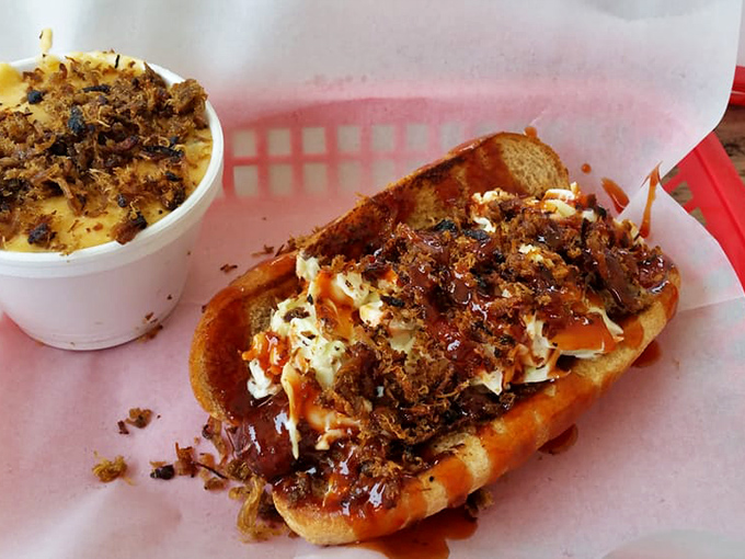 This isn't just a hot dog—it's a masterpiece of beef, slaw, and those magical pork crispins that would make even the most dignified diner lick their fingers. 