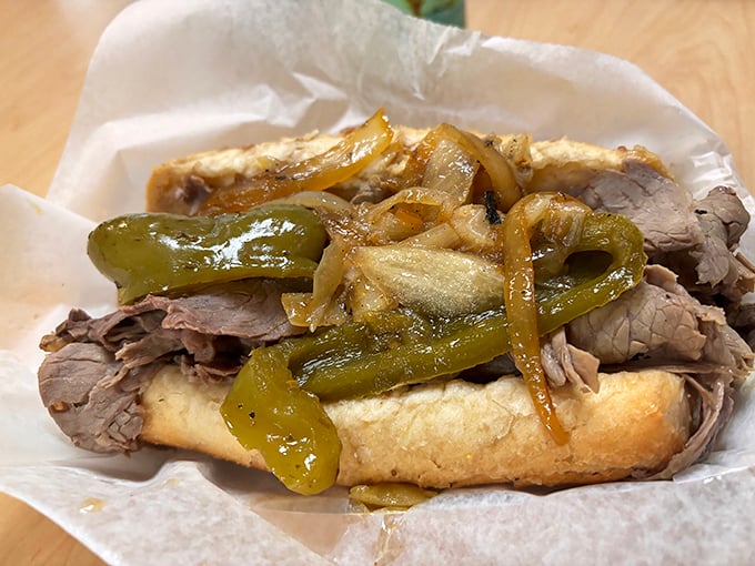 This Italian beef sandwich isn't just a meal—it's a juicy, pepper-topped masterpiece that demands both hands and several napkins.