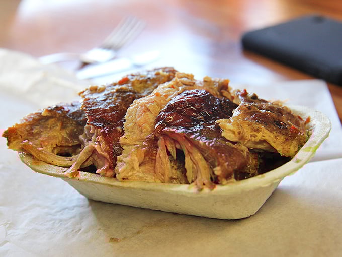 Behold the holy grail of Lexington-style barbecue—tender pork shoulder with that perfect bark, where smoke and time perform their delicious alchemy.