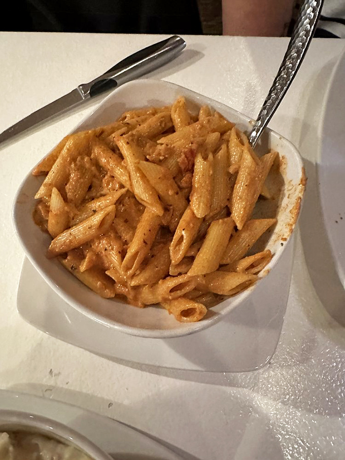 This creamy penne pasta isn't just comfort food—it's a warm hug in a bowl that makes you wonder why you'd ever eat anything else.