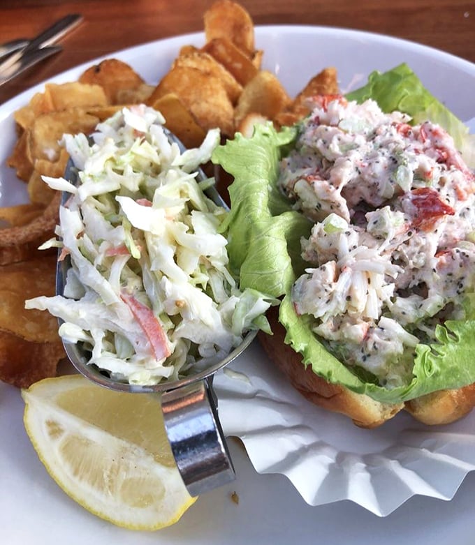 The lobster roll that launched a thousand road trips—chunky, perfectly dressed, and served with house-made chips that'll make you forget store-bought ever existed.