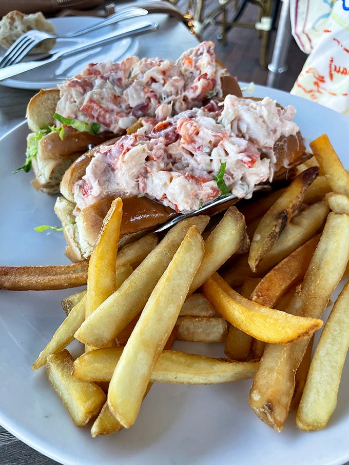 The holy grail of lobster rolls—chunky, sweet meat barely kissed with mayo, nestled in a buttered roll with fries that somehow stay crisp in Florida humidity.