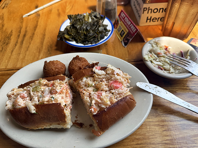 This lobster roll isn't playing games—chunky meat, perfectly toasted roll, and sides that don't just phone it in. Worth every calorie.