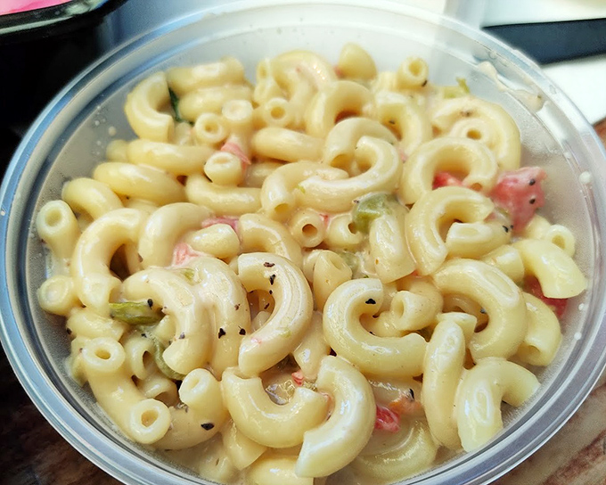 Mac and cheese that doesn't pretend to be sophisticated. This is comfort food that hugs your soul with creamy, cheesy goodness.