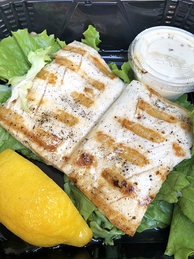 Perfectly grilled mahi mahi arrives with beautiful char marks that would make any grill master jealous.