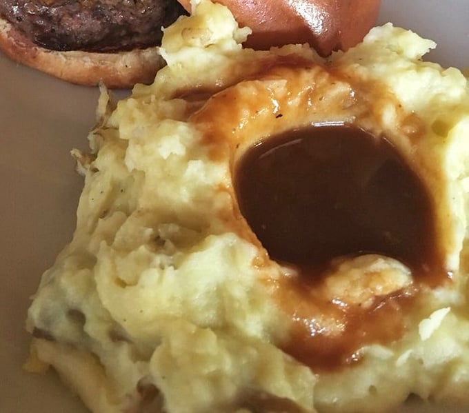 Behold the star of our show—garlic mashed potatoes with a gravy lake so perfect you'll want to dive in headfirst.