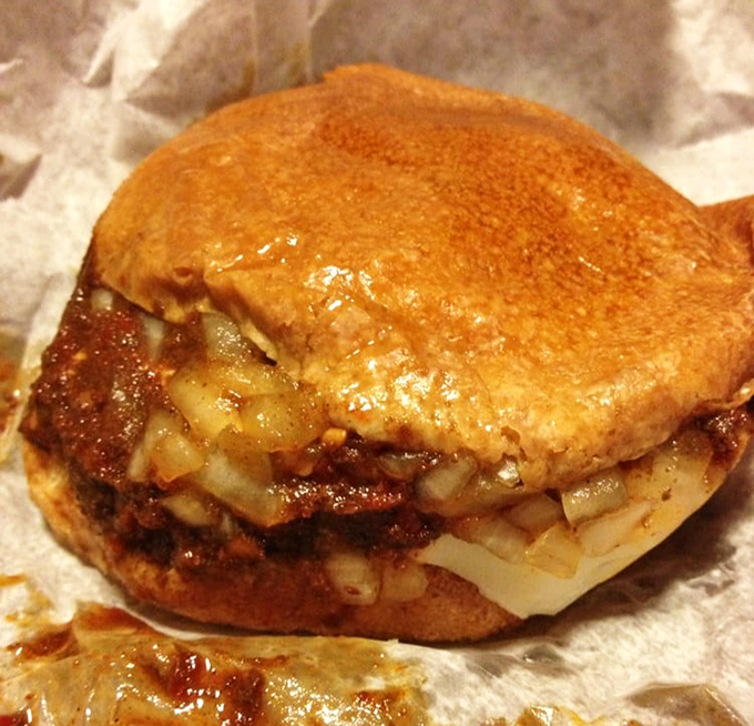 The legendary "screamer" burger doesn't whisper its intentions – that melted cheese and signature chili sauce demand your full attention and respect.