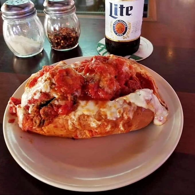 This meatball sub isn't trying to win beauty contests—it's too busy delivering the kind of saucy, cheesy comfort that makes Monday meetings bearable.