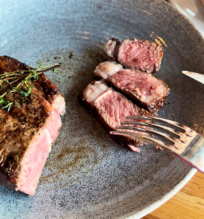 Perfectly seared steak that makes you want to write poetry. The kind of medium-rare that meat dreams are made of. 