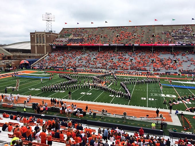 Game day at Memorial Stadium – where thousands of orange-clad fans and a marching band create the quintessential Midwestern college football experience.