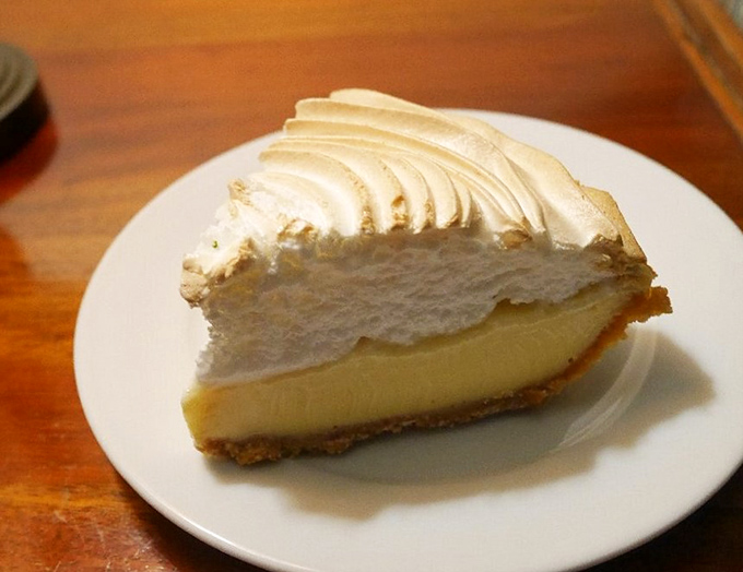 That meringue! Towering like cumulus clouds over the Florida Keys, it's the perfect pillowy counterpoint to the tangy filling below.
