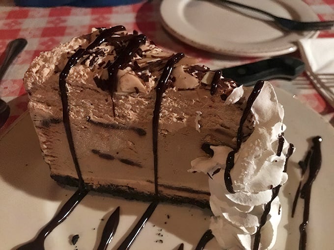 This isn't just dessert—it's a chocolate meditation. Layers of creamy decadence that make you forget you just demolished a steak.