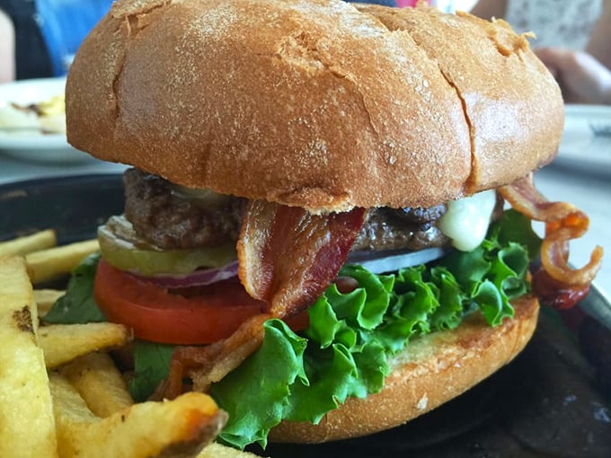 This isn't just a burger; it's edible architecture. Notice how that perfectly toasted bun contains the juicy masterpiece within – engineering you can eat!