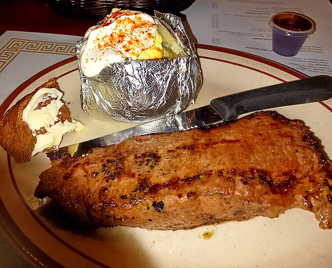 This NY strip arrives dressed to impress, with a foil-wrapped potato playing the perfect sidekick.