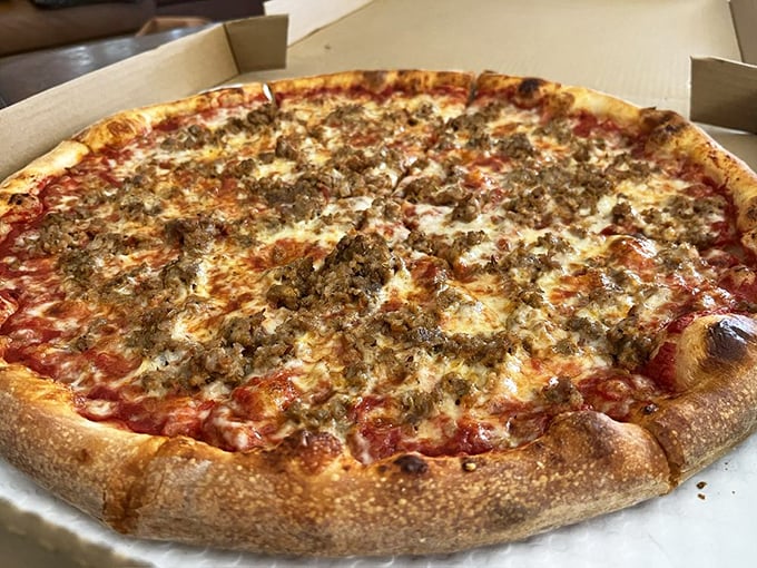 This sausage-topped NY-style pizza doesn't just talk the talk—it folds the fold, with a crust that somehow manages to be both substantial and ethereal.