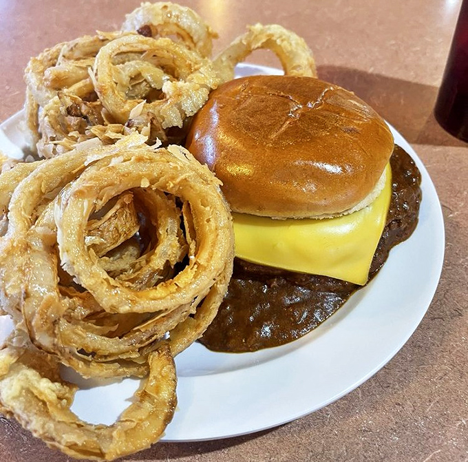 These aren't just onion rings—they're golden halos of happiness that have launched a thousand detours. Worth every crispy, addictive bite.