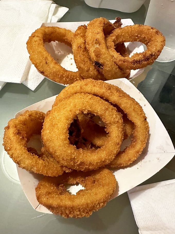 Golden halos of happiness—these onion rings achieve that mythical balance of crispy exterior and sweet, tender onion within.