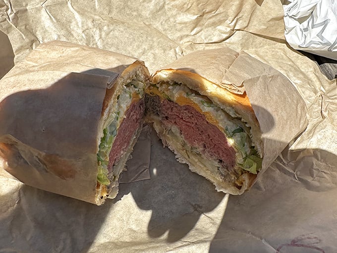 Not so much a sandwich as an engineering marvel of meat and bread. The cross-section reveals the true artistry at work.
