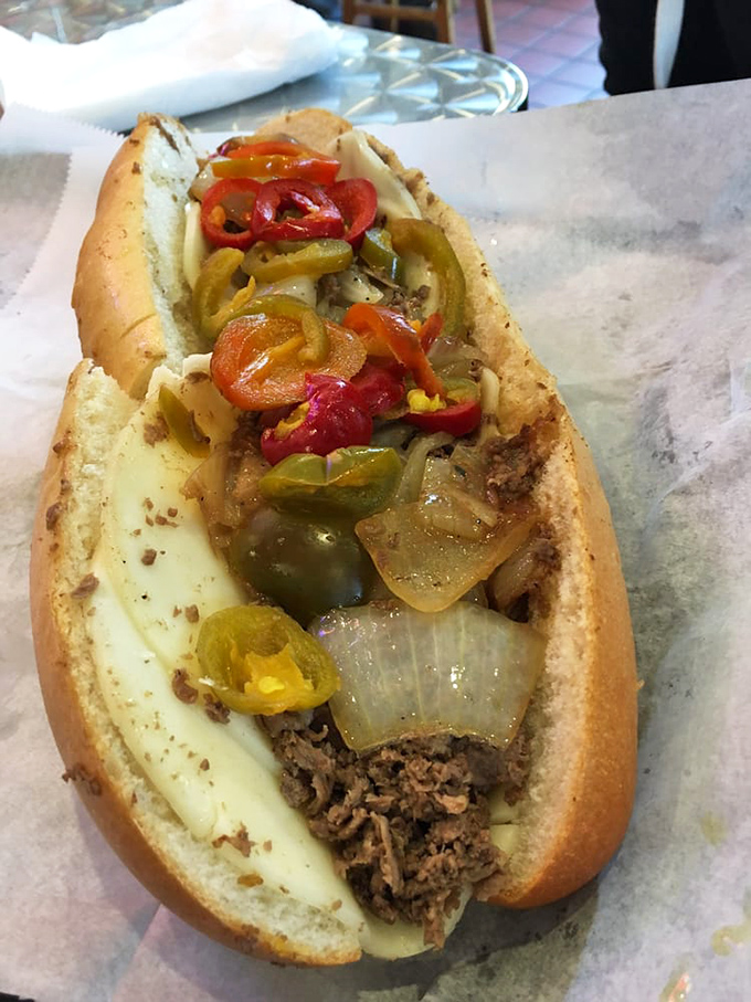 A pepper steak in its natural habitat – notice how the colorful peppers add both visual appeal and a sweet-spicy kick to the meaty masterpiece.