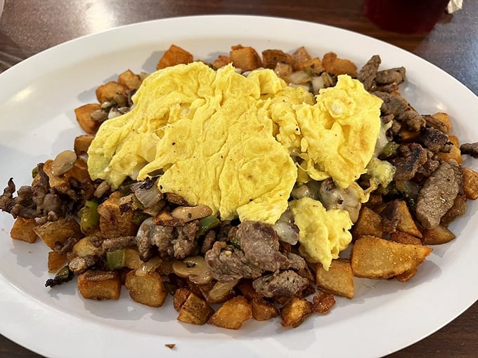 This skillet scramble isn't just breakfast—it's a beautiful mountain range of protein and potatoes that might require a climbing permit to conquer.