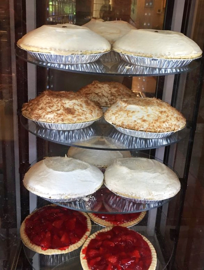 Behold the pie display that could make a grown person weep with joy – resistance is futile and unnecessary.