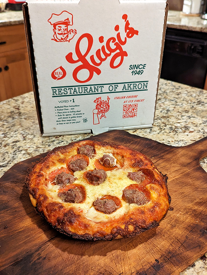 This isn't just pizza – it's edible history. The perfect ratio of cheese to sauce, with those little cups of pepperoni that collect flavor.