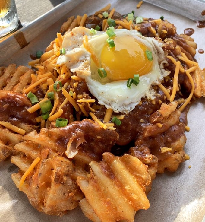 Breakfast meets BBQ in this waffle fry poutine topped with a sunny-side-up egg – the morning-after remedy you never knew you needed.