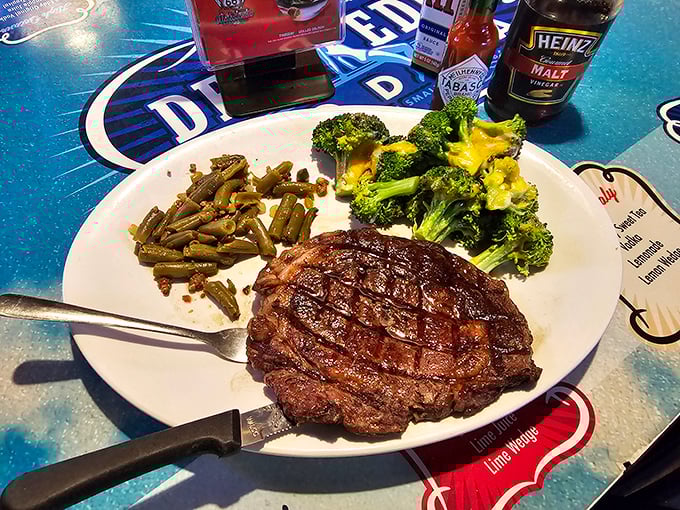 The prime rib that commands respect, served on a table that celebrates American road culture. This isn't dinner – it's manifest destiny on a plate.