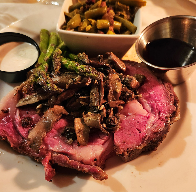 This perfectly medium-rare prime ribeye isn't just dinner – it's a carnivore's dream with a sear that should be hanging in an art gallery.