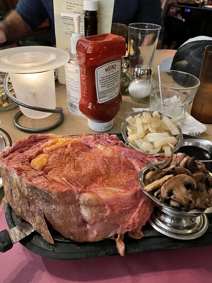 Behold the prime rib in all its magnificent glory! This isn't just meat—it's a carnivore's dream that makes vegetarians question their life choices.