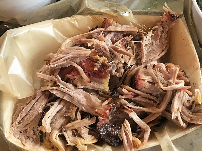 Pulled pork perfection—tender strands of smoky goodness with that coveted mix of bark and meat. This is what barbecue dreams are made of.
