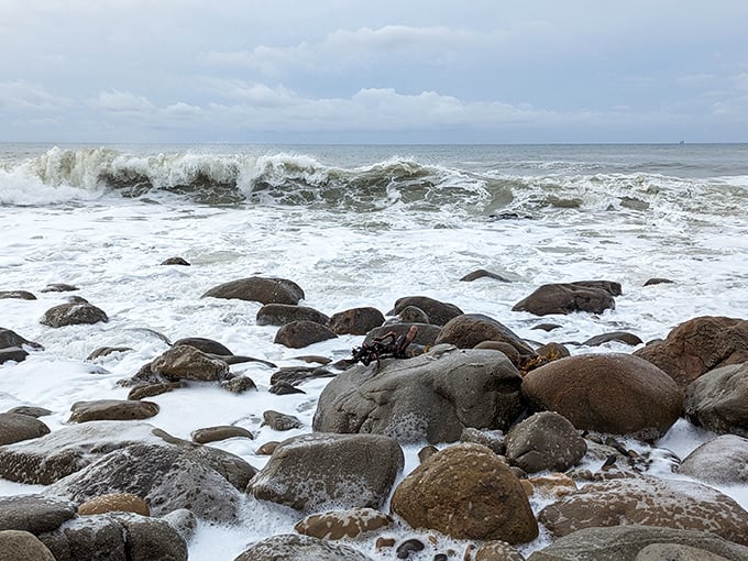 The Pacific introduces itself differently here—sometimes with gentle laps, other times with dramatic crashes against these ancient sentinels.