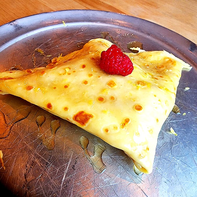 This delicate raspberry crepe might seem out of place at a burger joint, but one bite explains why people drive across Ohio to experience this golden-hued masterpiece.