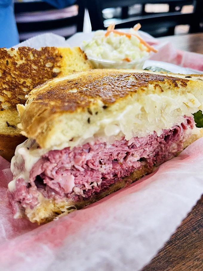 The Reuben in its natural habitat—gloriously grilled, perfectly stacked, and posing for its glamour shot before disappearing in five blissful minutes.