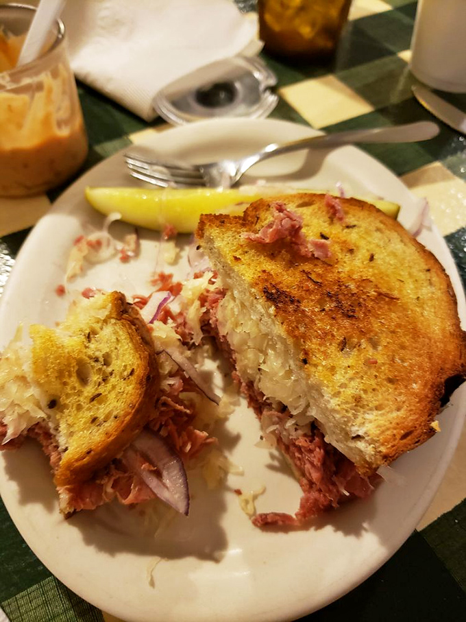 This Reuben isn't just a sandwich, it's architecture—a perfect balance of corned beef, sauerkraut, and Swiss that would make any New Yorker weep with joy.