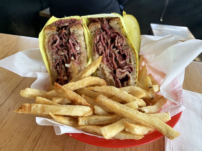 The Reuben doesn't just whisper "eat me"—it belts it out like Aretha Franklin, with pastrami piled higher than your weekend expectations.