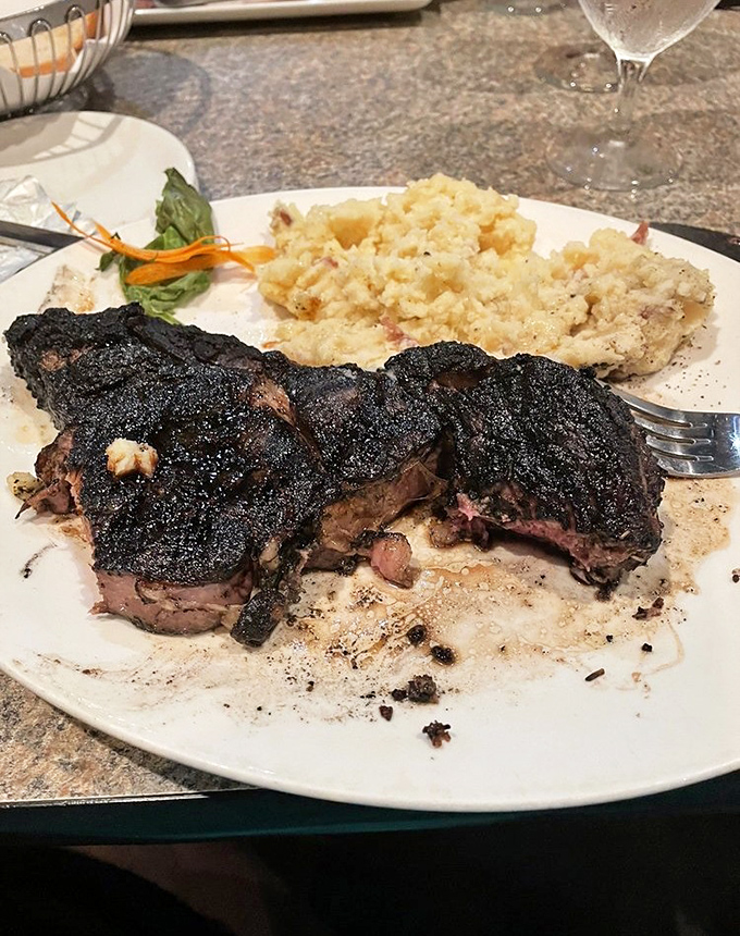 This blackened ribeye doesn't just flirt with your taste buds—it proposes marriage. The char whispers of open flames while the meat practically melts.