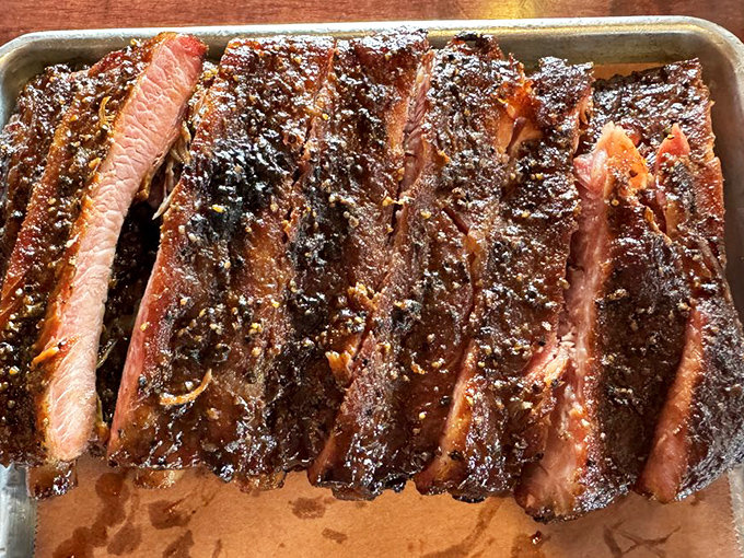 These ribs don't just fall off the bone—they practically leap into your mouth with a perfect bark that's worth breaking any diet.