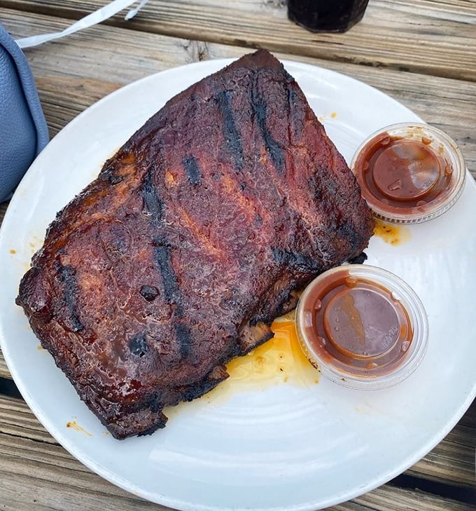 Behold the bark on these ribs—a smoky, caramelized masterpiece that makes you wonder if you've been eating barbecue wrong your entire life.