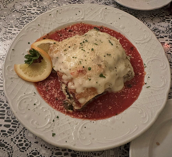 Layer upon layer of culinary bliss. This lasagna doesn't just sit on the plate—it tells a story of tradition with every bite.