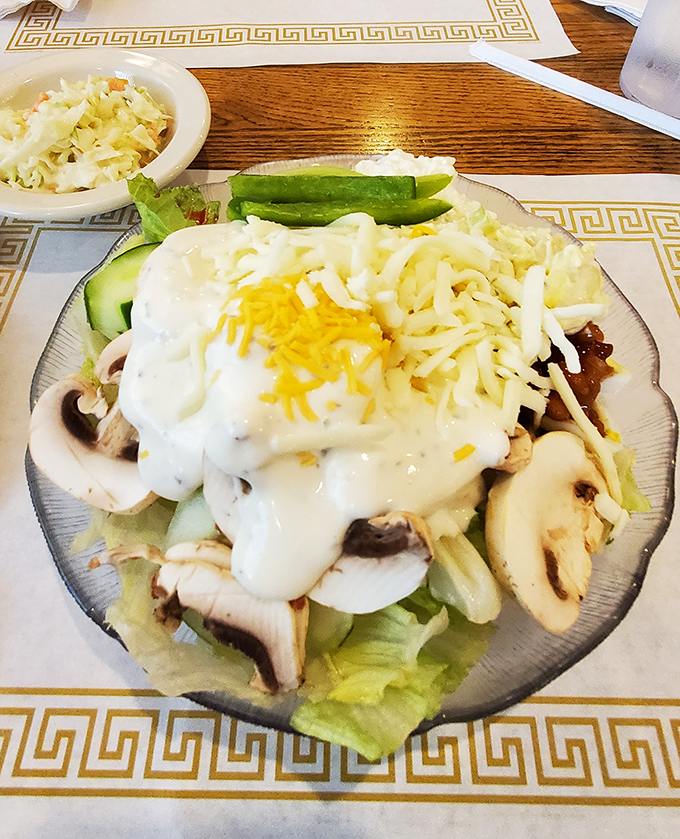 Garden-fresh ingredients transformed into a masterpiece of mushrooms, cheese, and creamy dressing. This isn't just a salad—it's edible architecture.